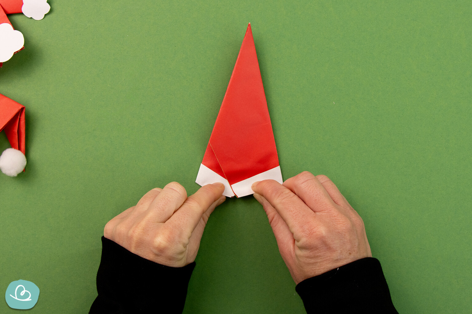 Nikolausmütze basteln | Einfache Origami-Anleitung - Wunderbunt.de